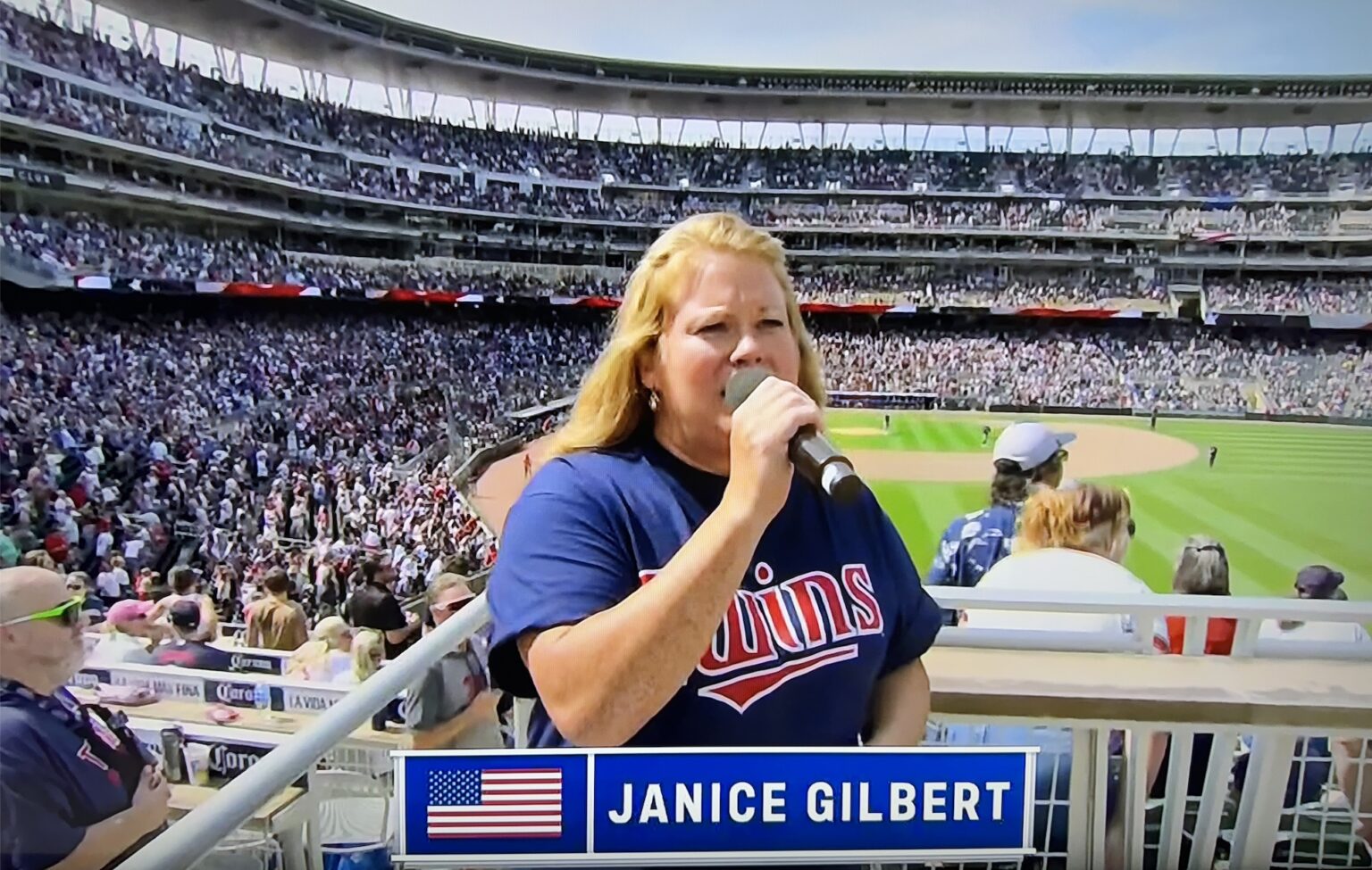 High school teacher, songwriter sings 'God Bless America' at Twins game ...